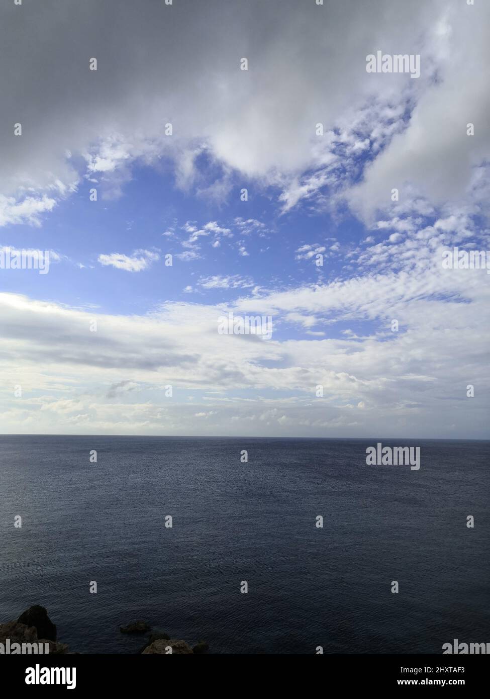 Clouds and the sea from above Stock Photo - Alamy