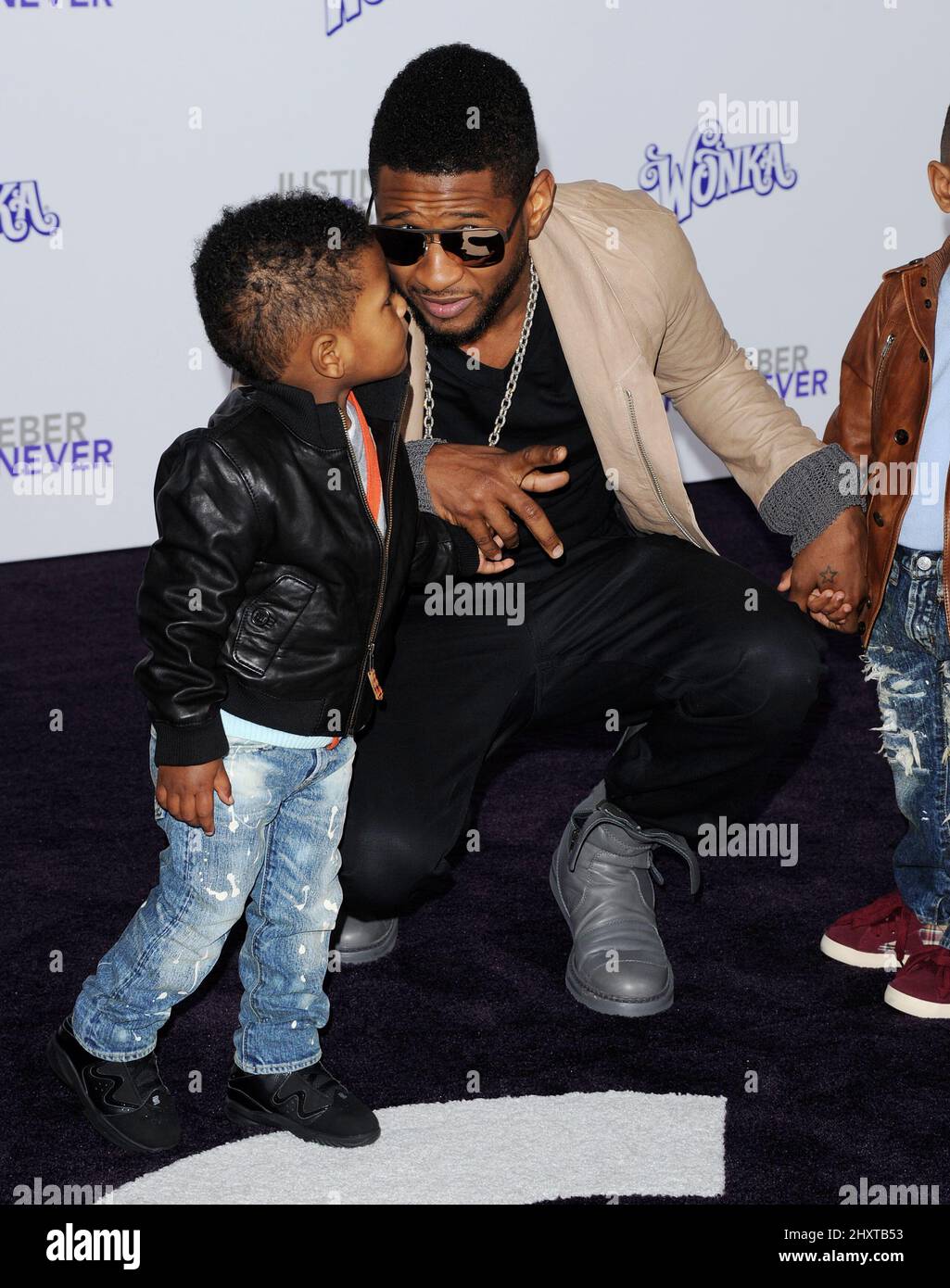 Usher with Kids at the "Justin Bieber - Never Say Never" Premiere held ...