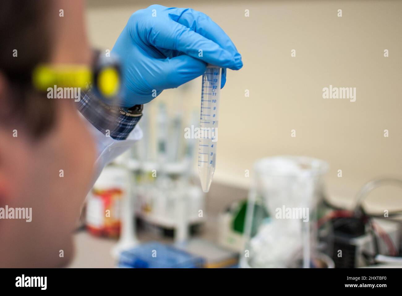 Scientist holding laboratory tube hi-res stock photography and images ...