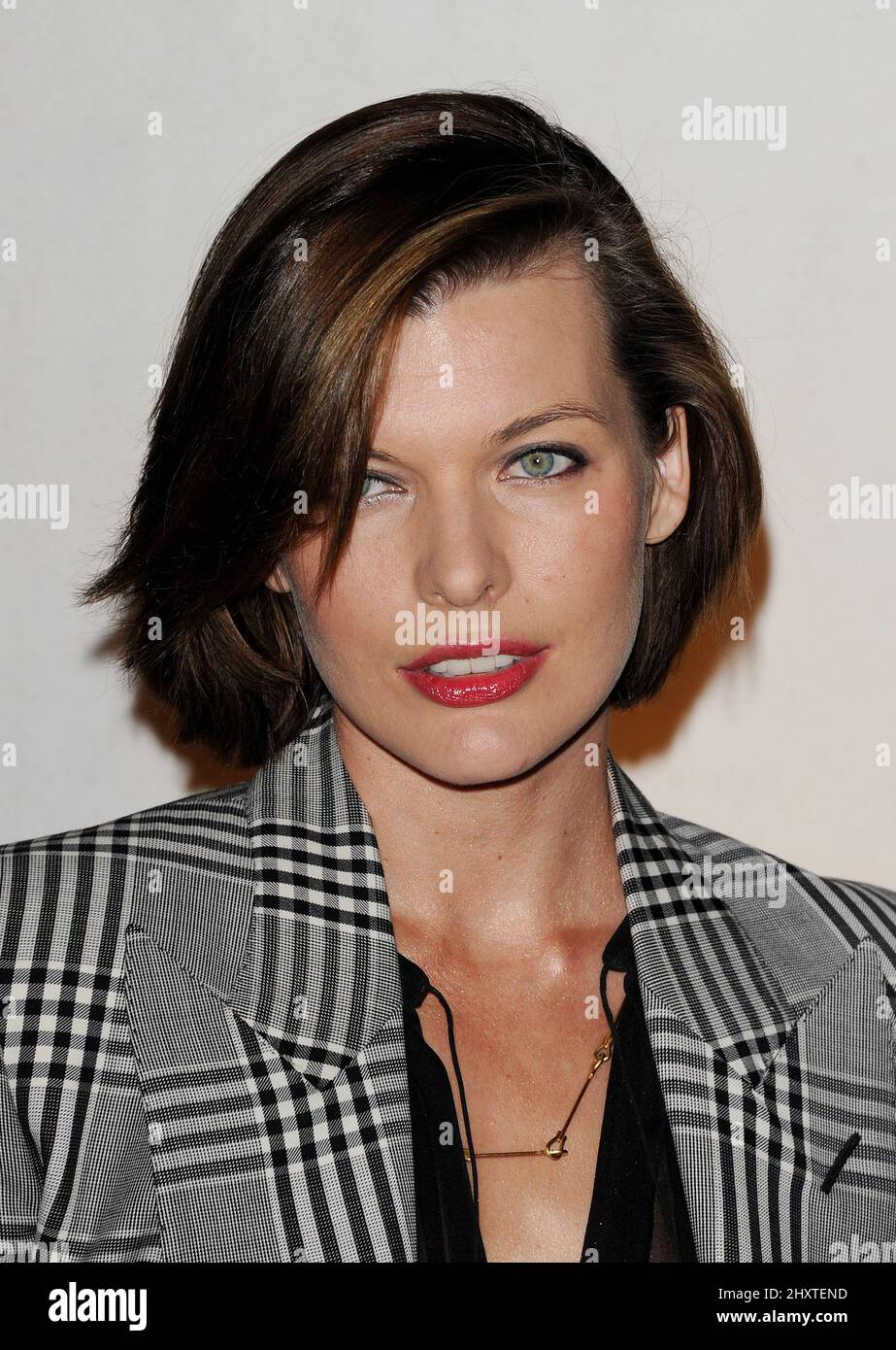 Milla Jovovich at the Tom Ford Beverly Hills Store Opening held, Los ...