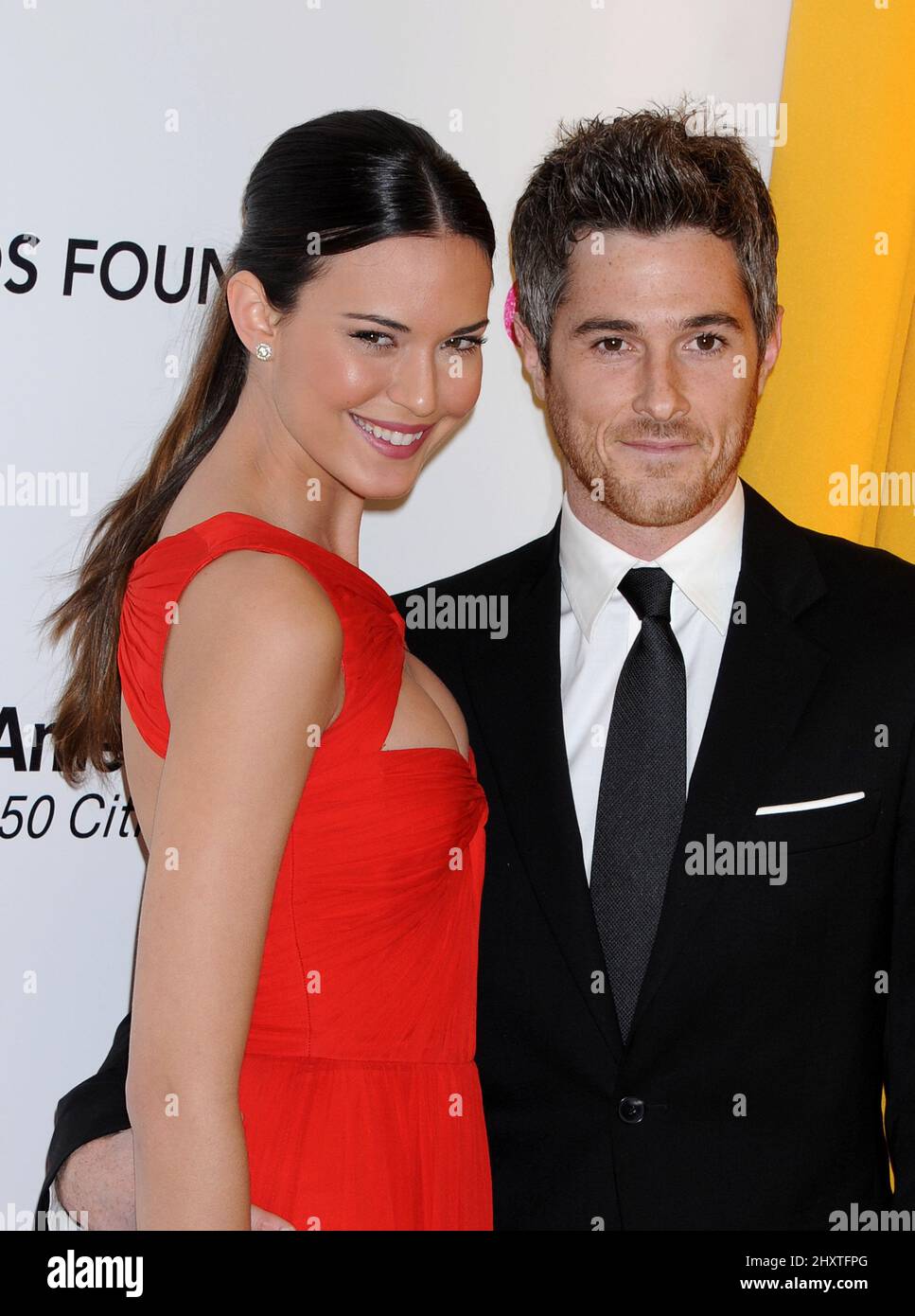Dave Annable and Odette Yustman attending the19th Annual Elton John ...