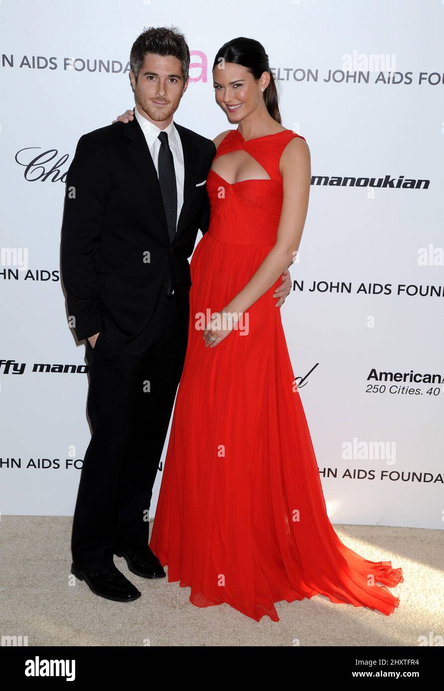 Dave Annable and Odette Yustman attending the19th Annual Elton John ...