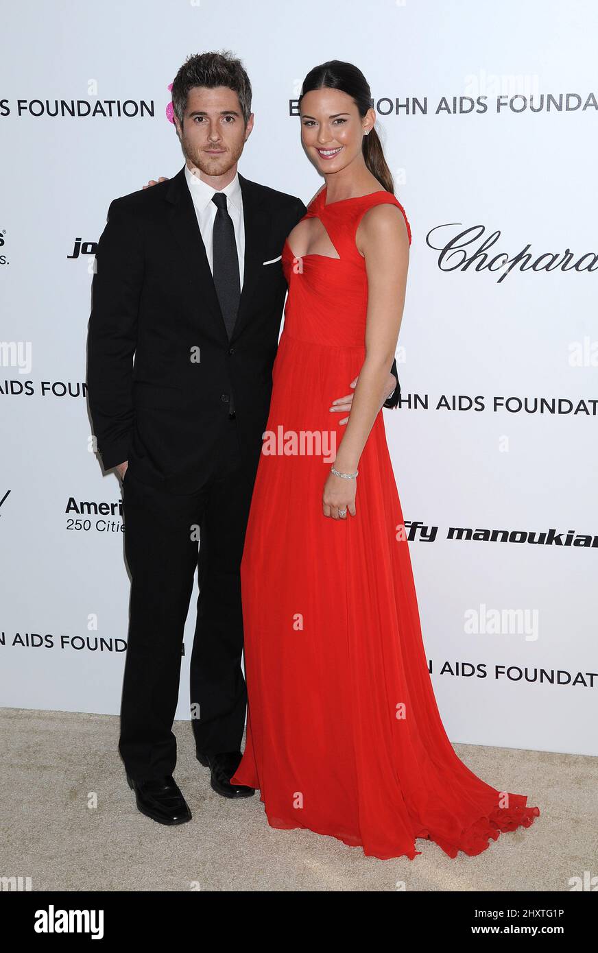 Dave Annable and Odette Yustman during the 19th Annual Elton John Aids ...