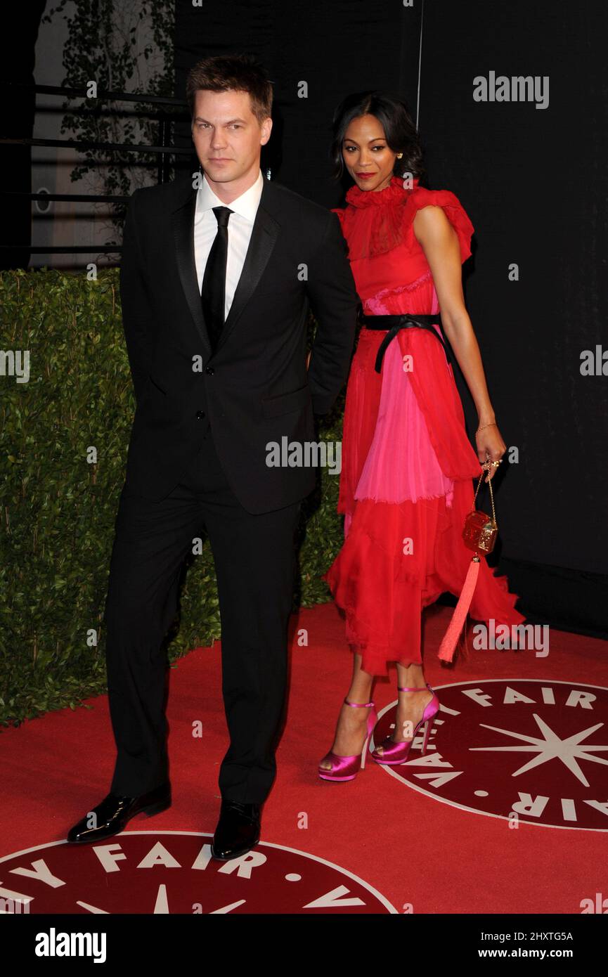 Keith Britton and Zoe Saldana attending the 2011 Vanity Fair Oscar ...