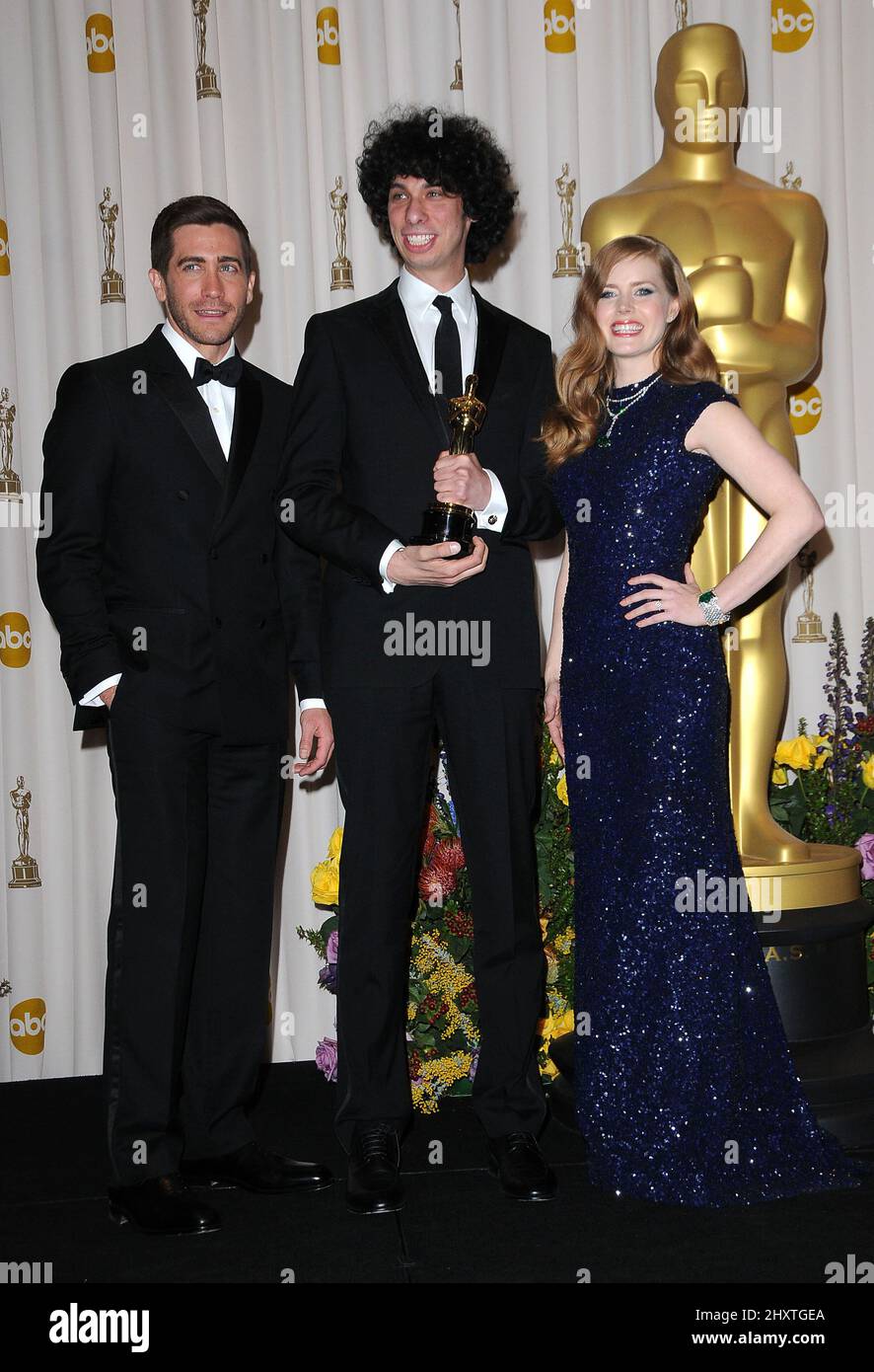 Jake Gyllenhaal with Luke Matheny and Amy Adams in the press room at ...