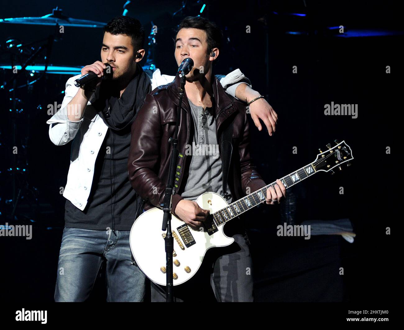 Joe Jonas and Kevin Jonas, of the Jonas Brothers performs during the ...