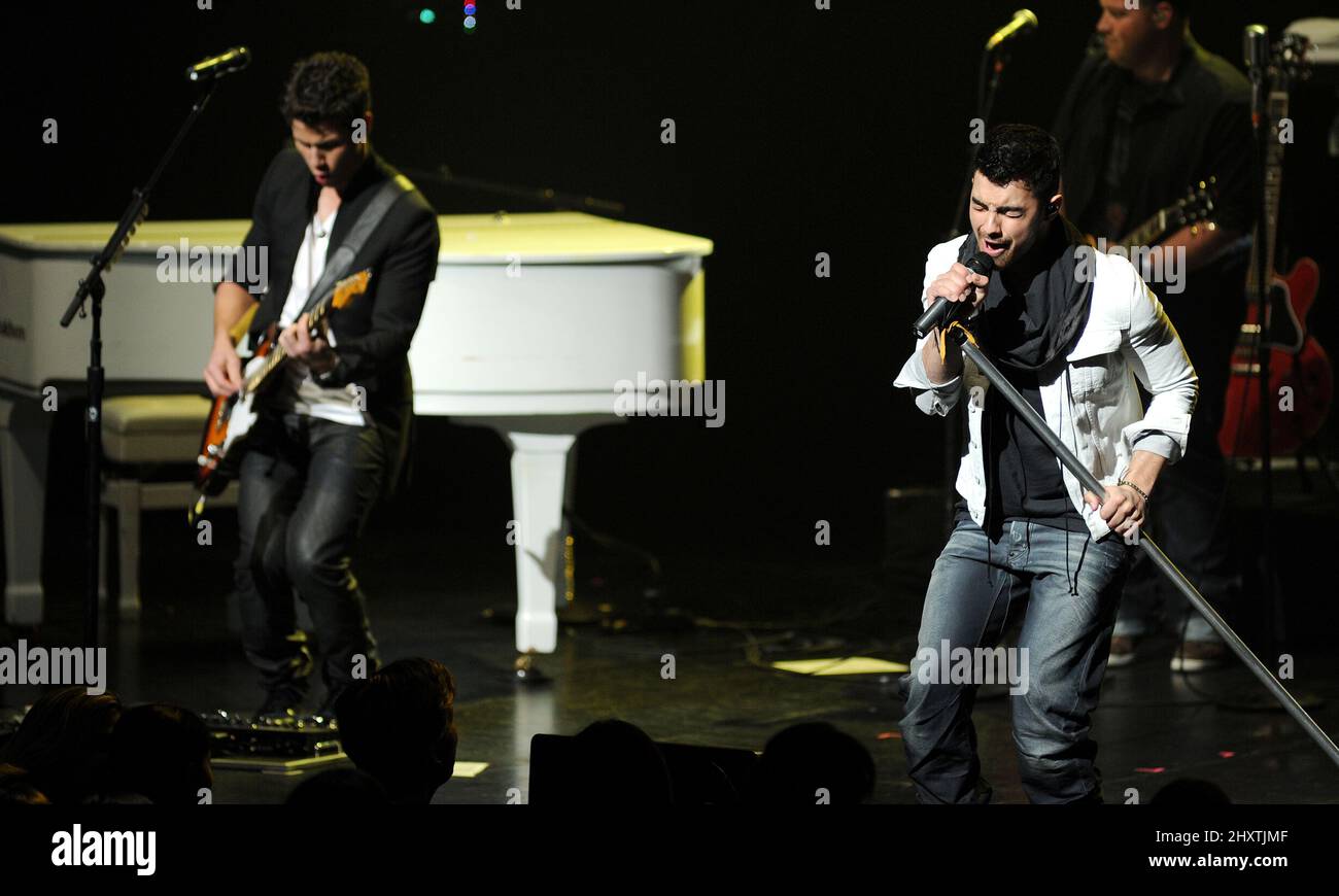 Nick Jonas and Joe Jonas, of the Jonas Brothers performs during the ...