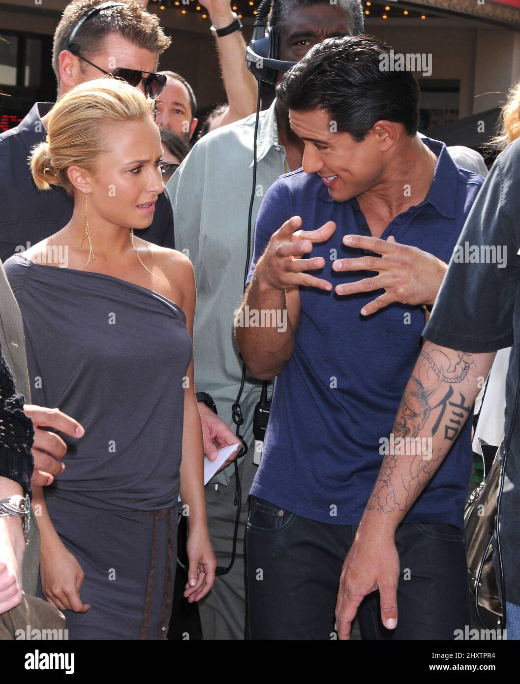 Hayden Panettiere and Mario Lopez on the set of Extra taping at The ...