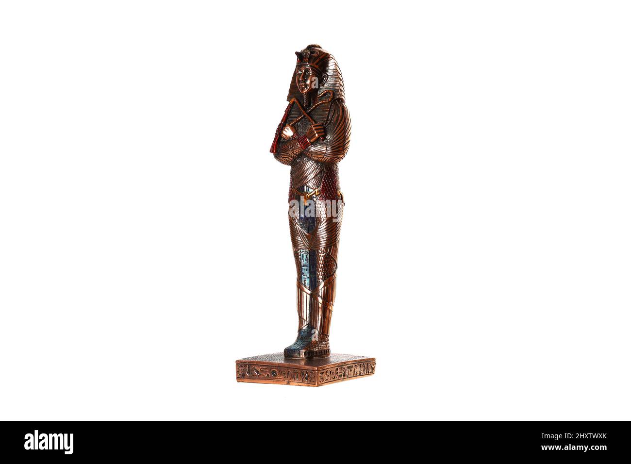 egyptian pharaoh figurine isolated on white background. side view. High ...