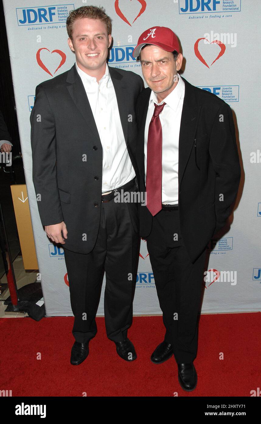Greg McElroy and Charlie Sheen attending the 8th Annual Juvenile ...