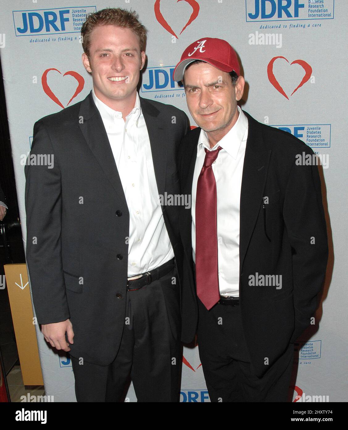 Greg McElroy and Charlie Sheen attending the 8th Annual Juvenile ...