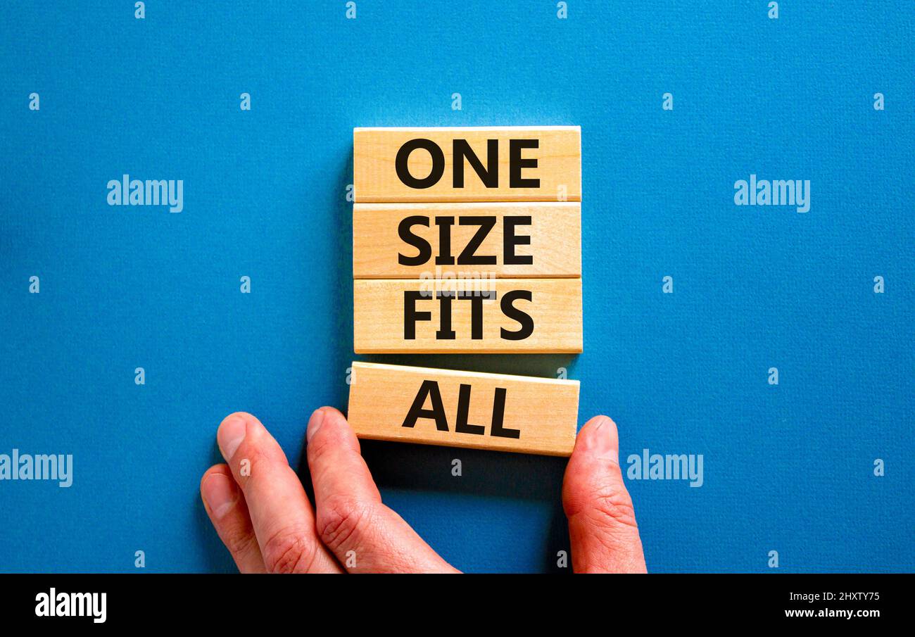 One size fits all symbol. Concept words One size fits all on wooden ...