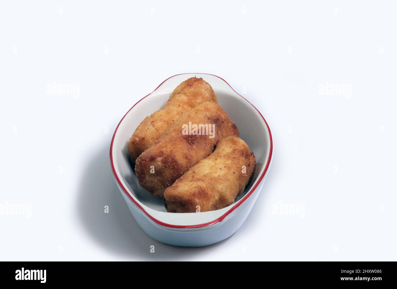 Closeup of traditional Risol with egg and mayonnaise on a white ...
