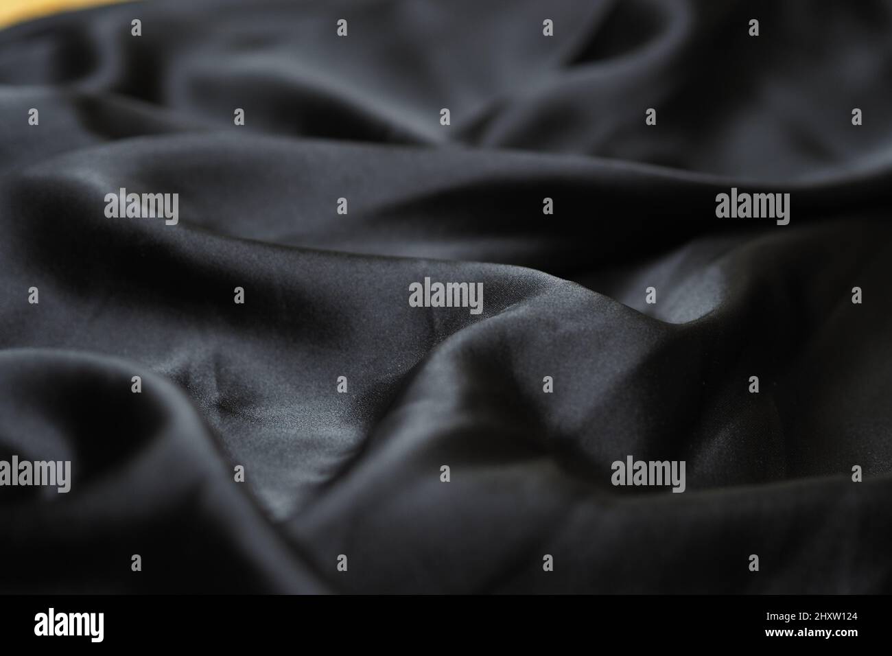 Closeup of a black fabric background Stock Photo - Alamy