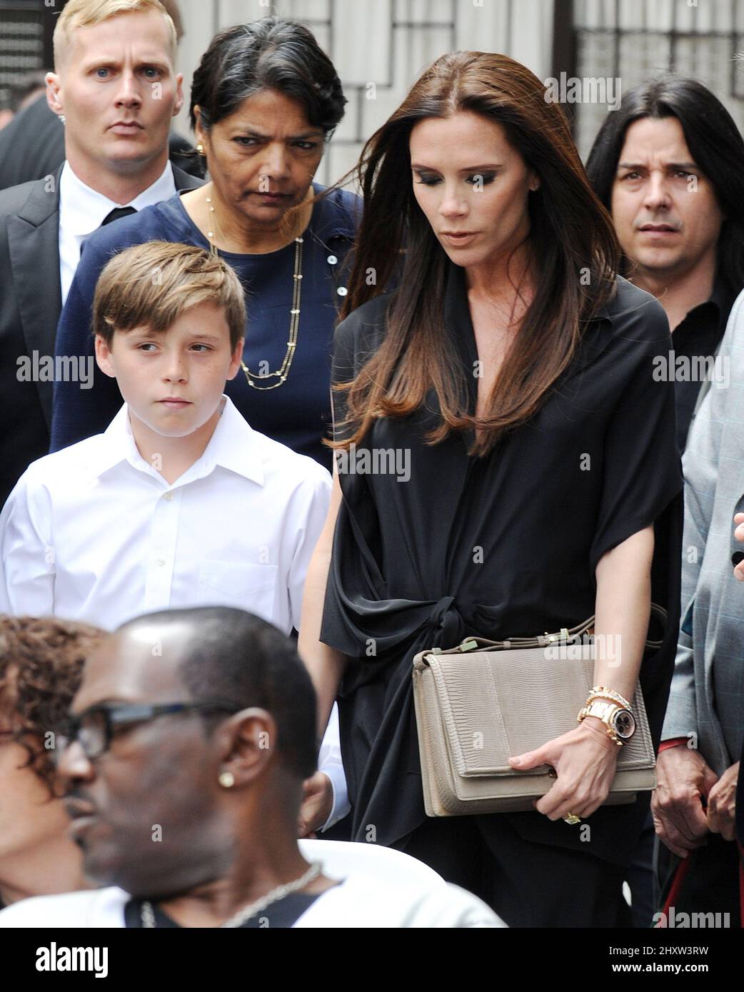 Victoria Beckham and her son at the ceremony celebrating Simon Fuller ...