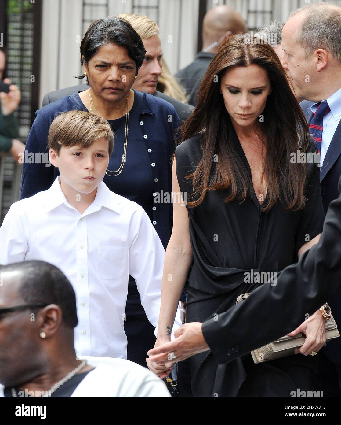 Victoria Beckham and her son at the ceremony celebrating Simon Fuller ...
