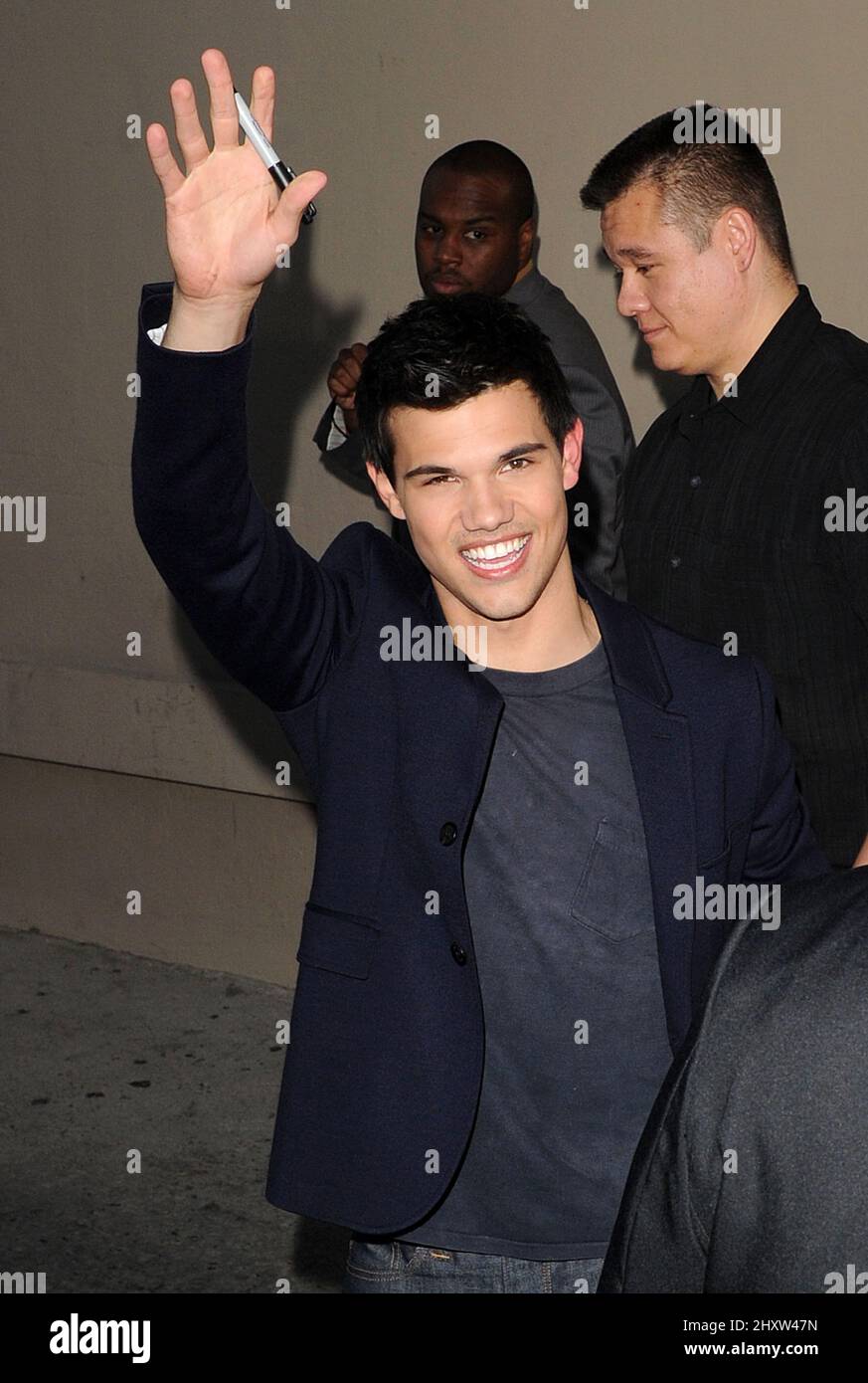 Taylor Lautner signs autographs Outside Jimmy Kimmel Live in Los ...