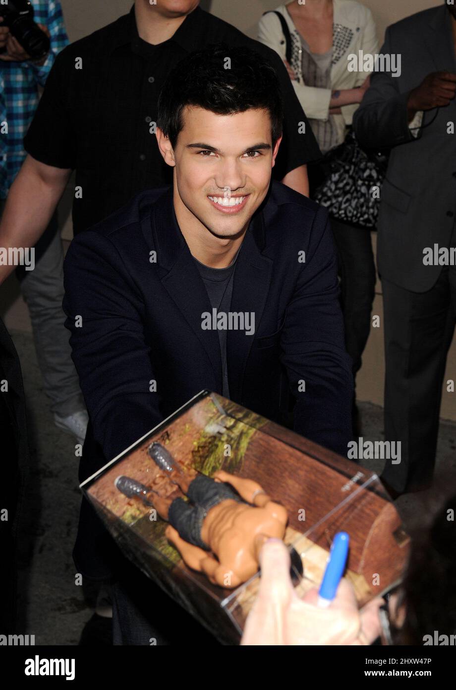 Taylor Lautner signs autographs Outside Jimmy Kimmel Live in Los ...