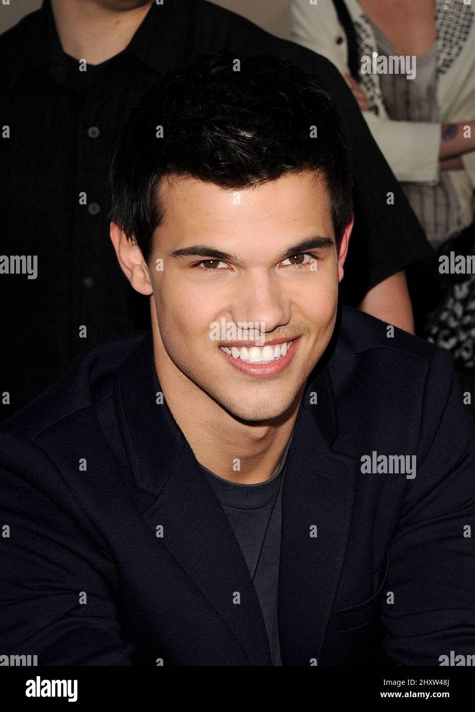 Taylor Lautner signs autographs Outside Jimmy Kimmel Live in Los ...
