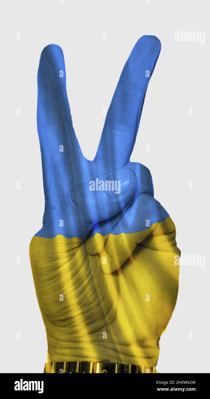 Vertical shot of the peace symbol with the Ukrainian flag Stock Photo ...