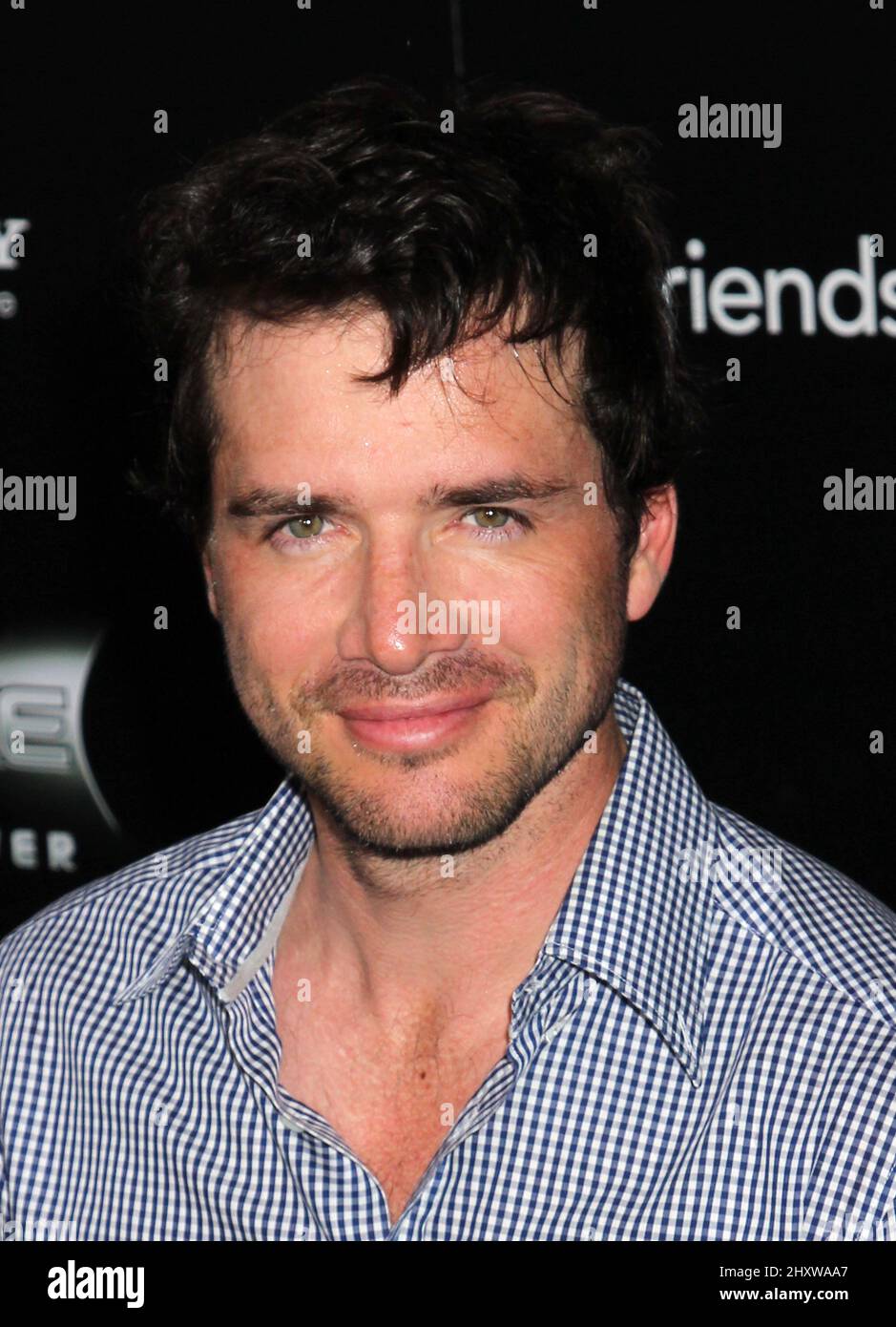 Matthew Settle attending the "Friends With Benefits" New York premiere ...