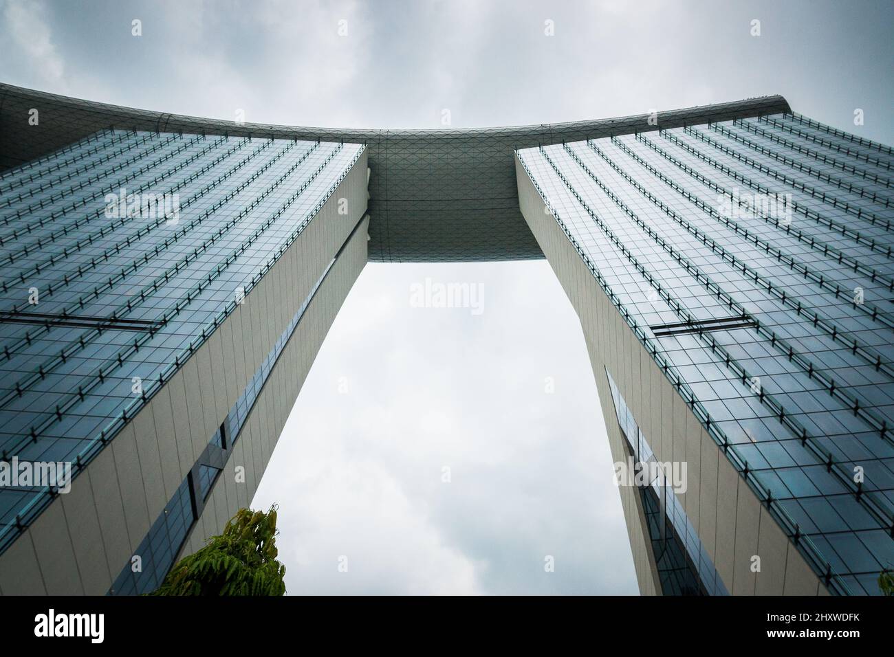 A low angle symmetric shot of Marina Bay Sands building in Singapore ...