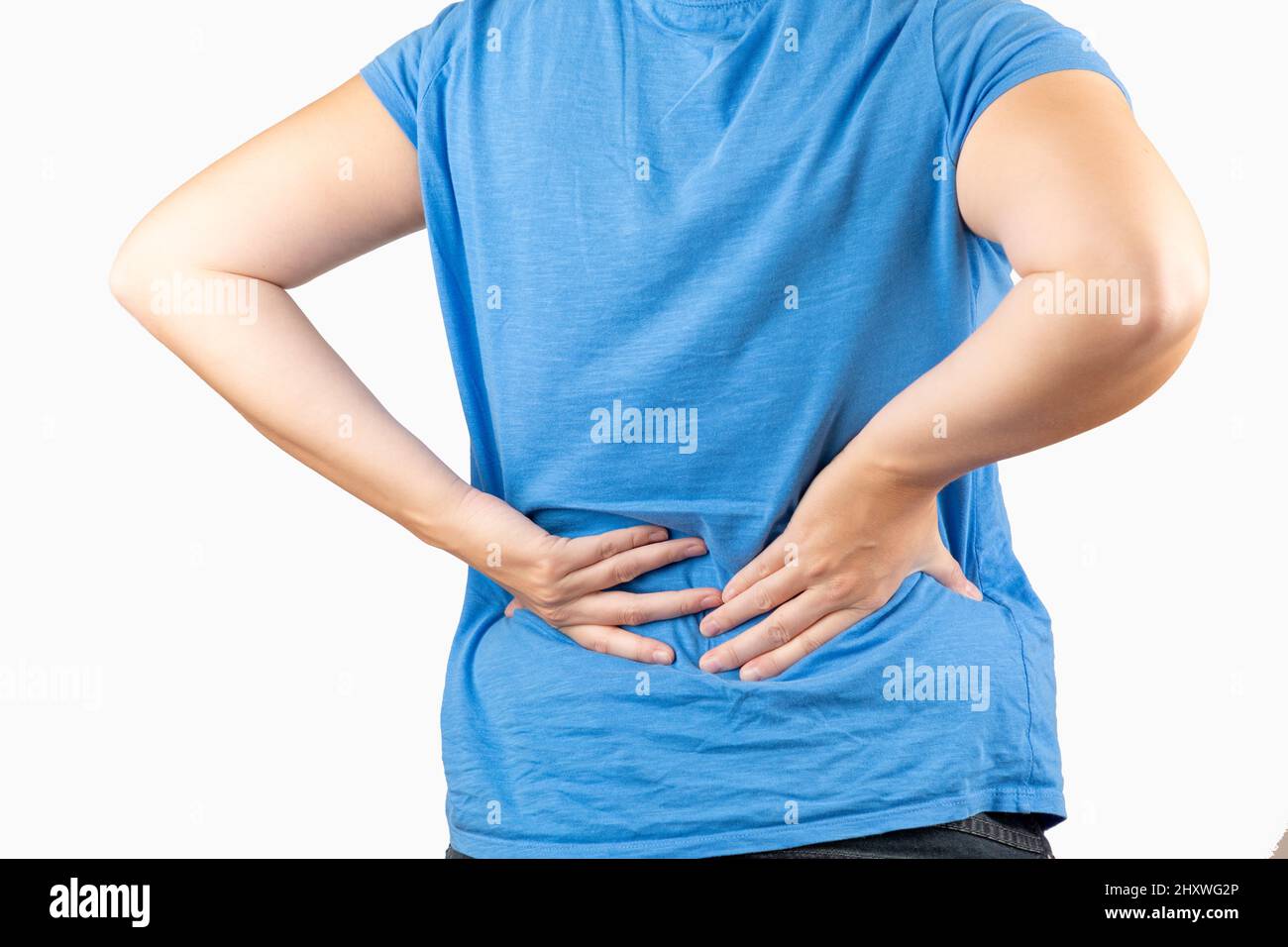 Woman with back pain isolated on white background Stock Photo - Alamy