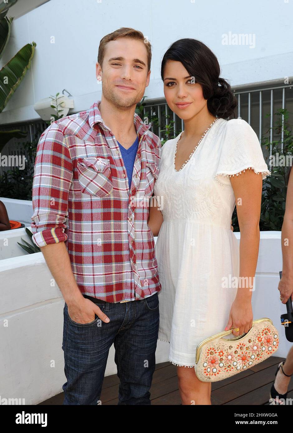 Dustin Milligan and Alyssa Diaz during the "Shark Night 3D" Pool Party ...