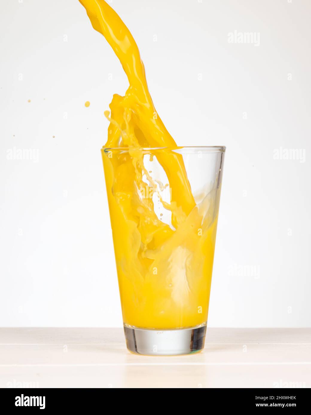Multivitamin juice pouring in hi-res stock photography and images - Alamy