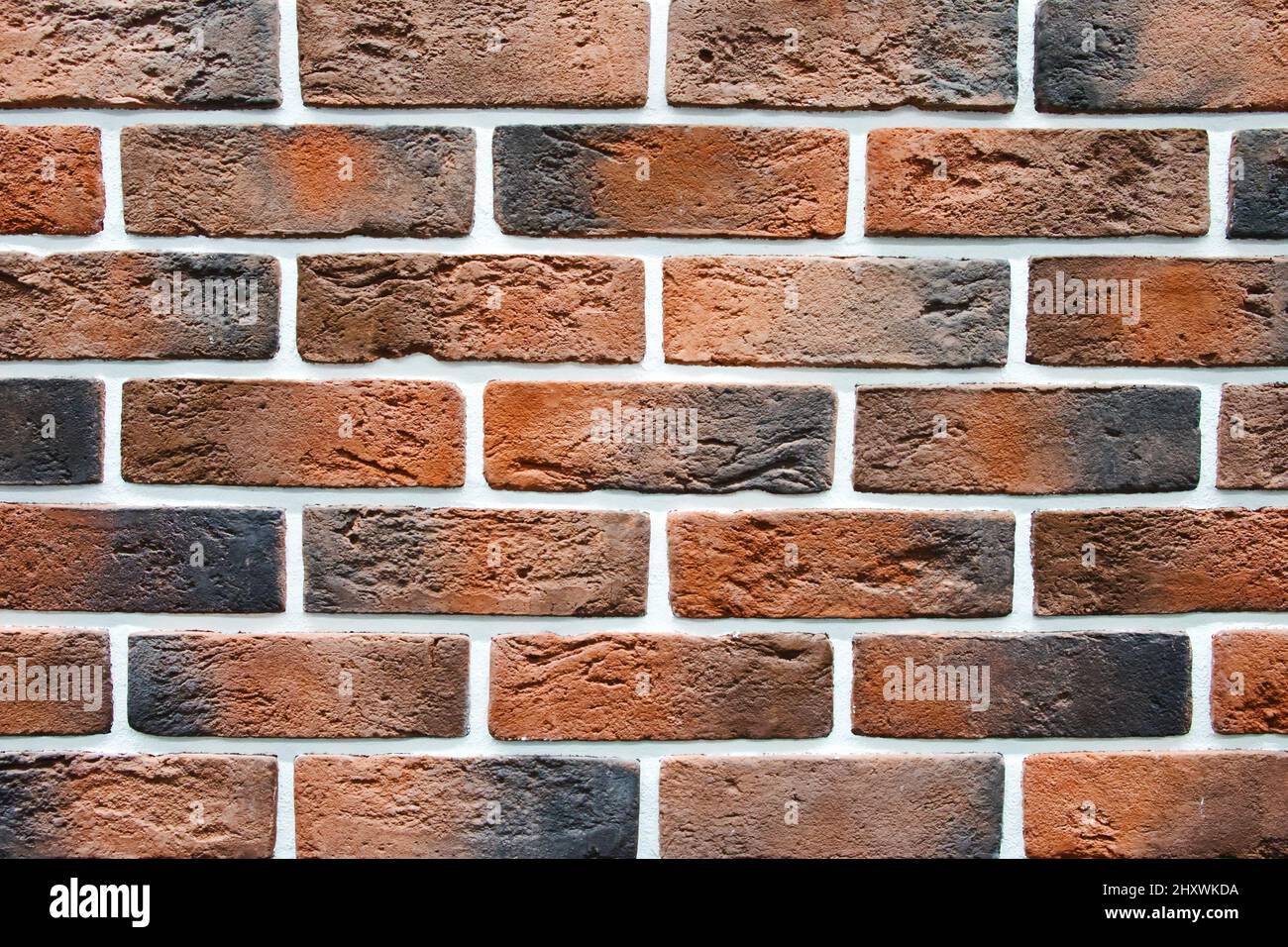 Background red wall bricks with cement closeup. Red brick wall texture ...