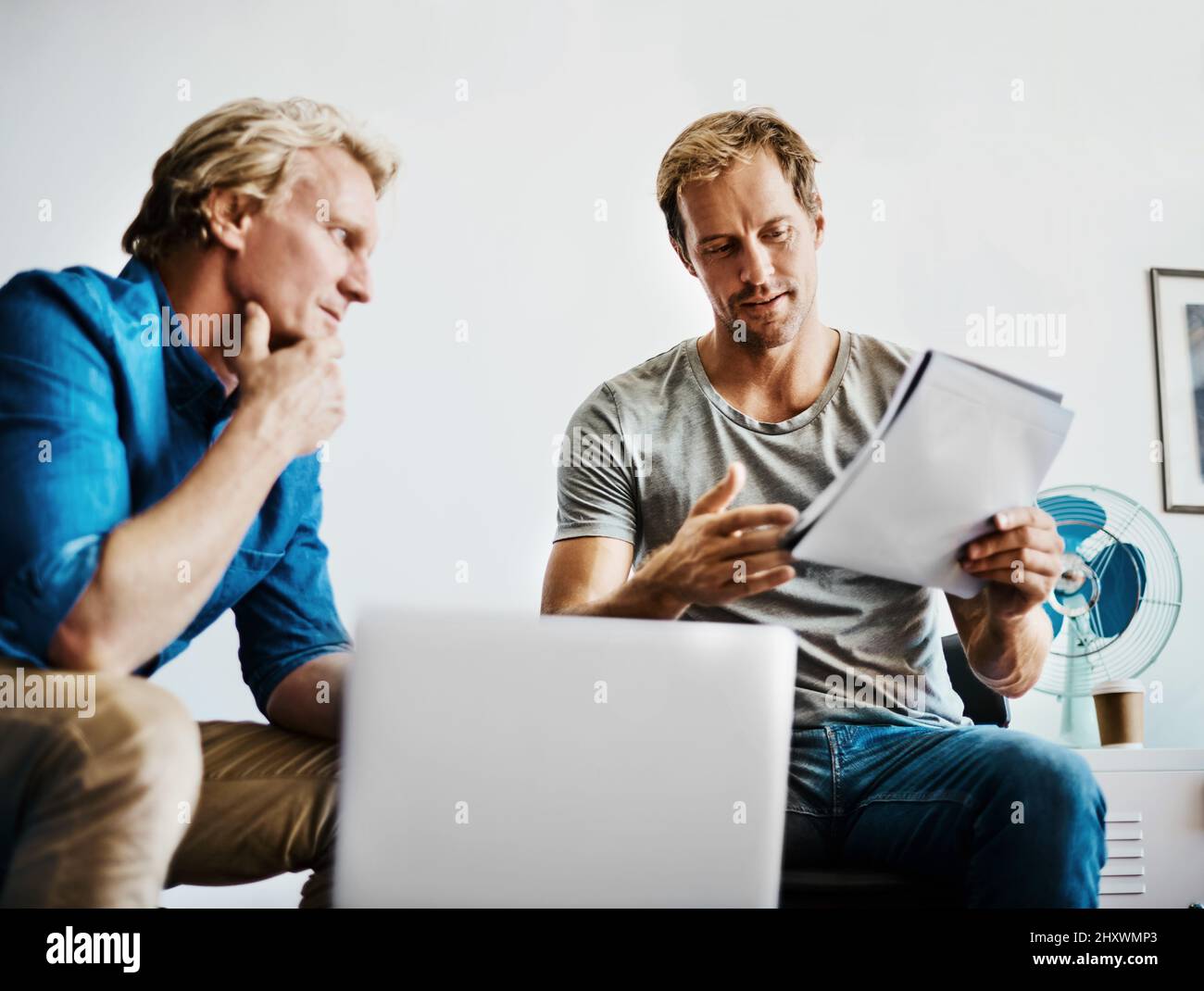 Analysing their plans carefully before taking action. Shot of two ...