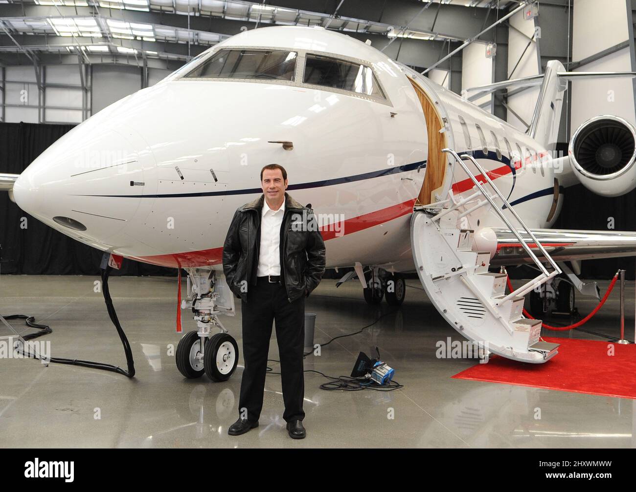 John Travolta joins Bombardier as a business aircraft ambassador during ...