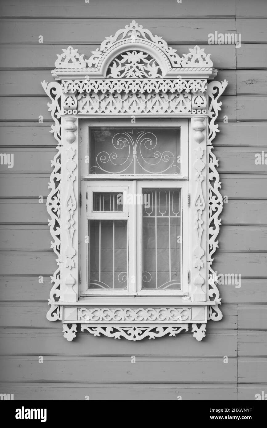 Ornamental window with carved frame of traditional russian rural wooden ...