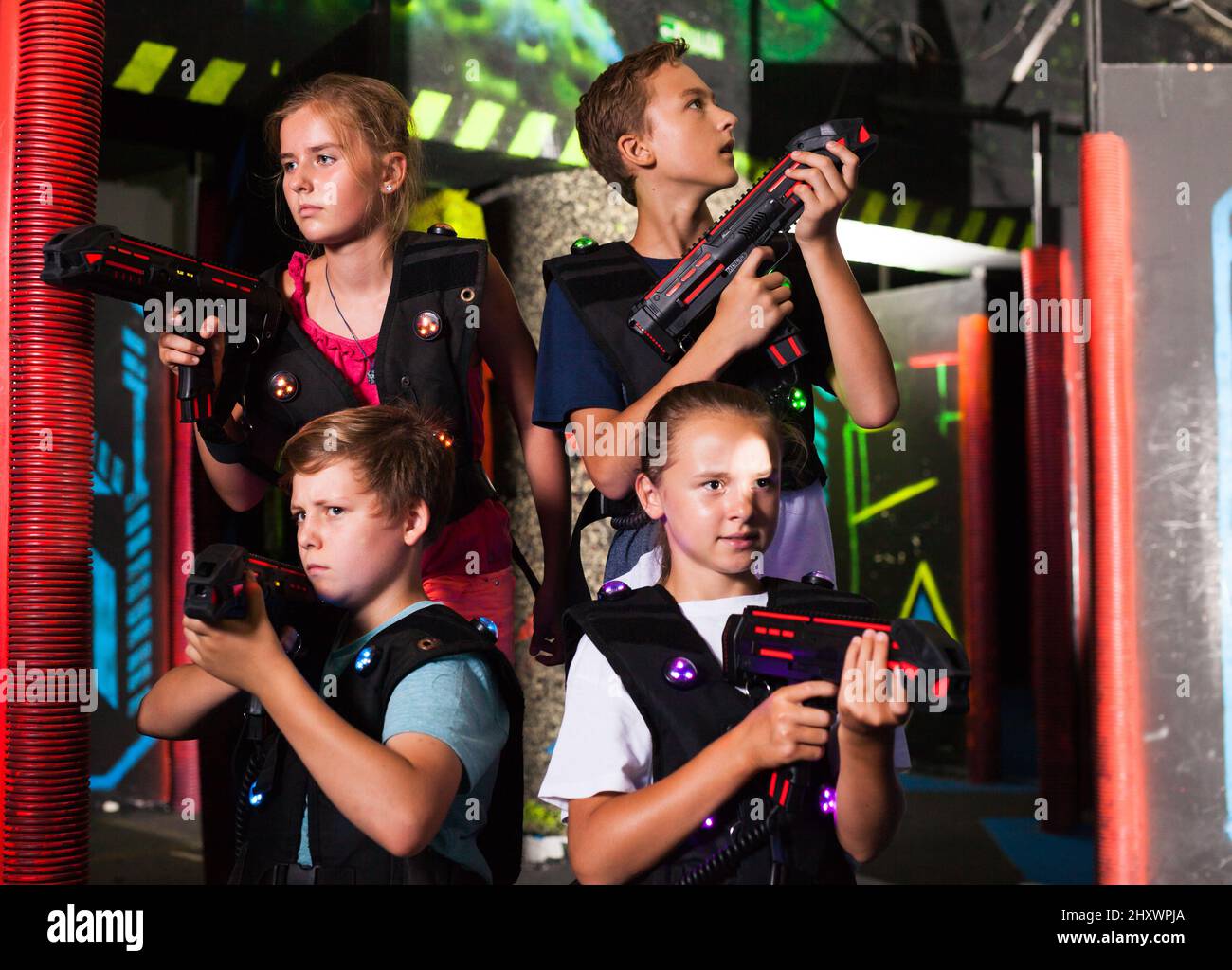 Teen kids with laser guns Stock Photo - Alamy