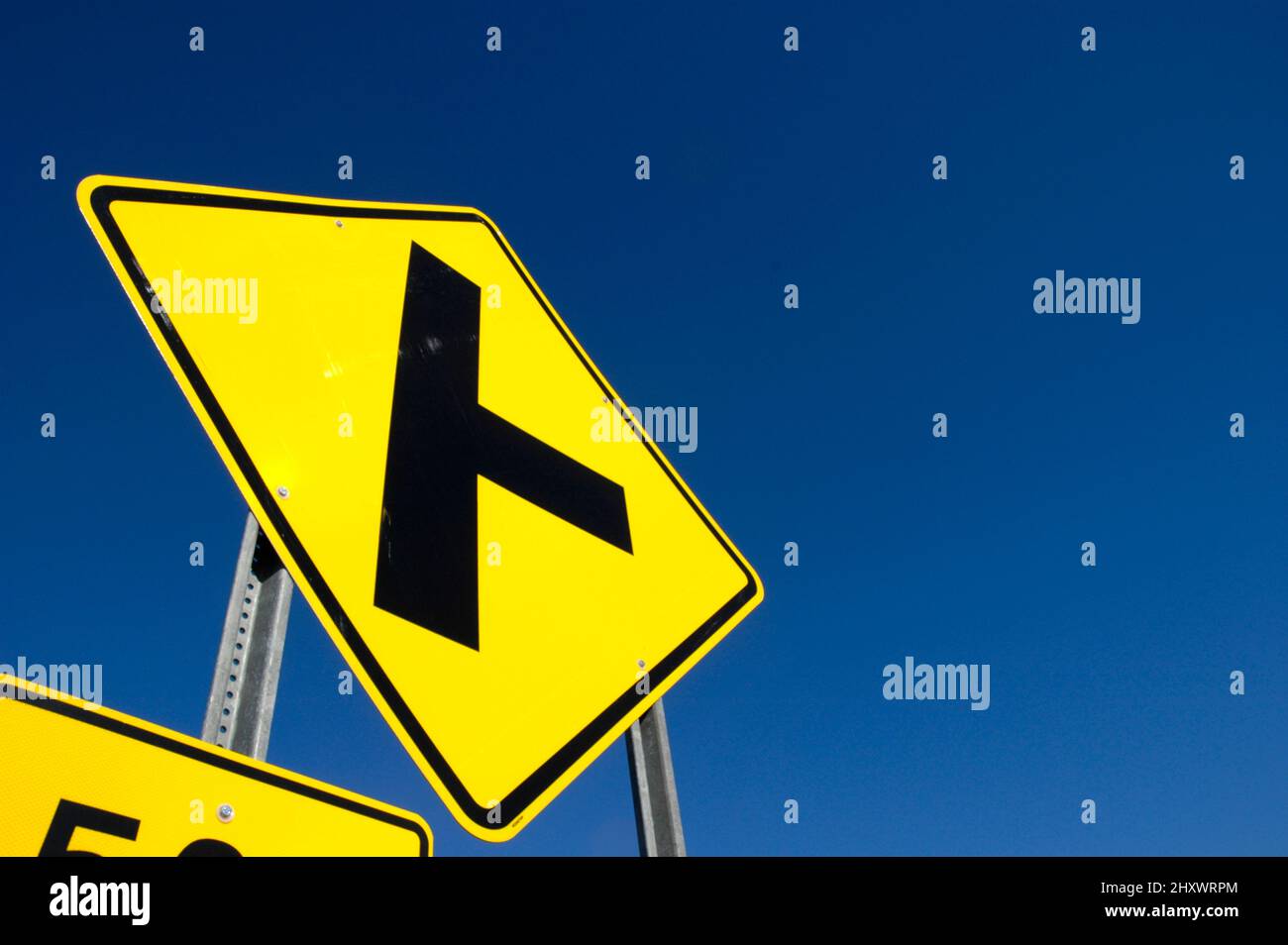 Freeway and road signs on the shoulder of the roadway bed Stock Photo ...