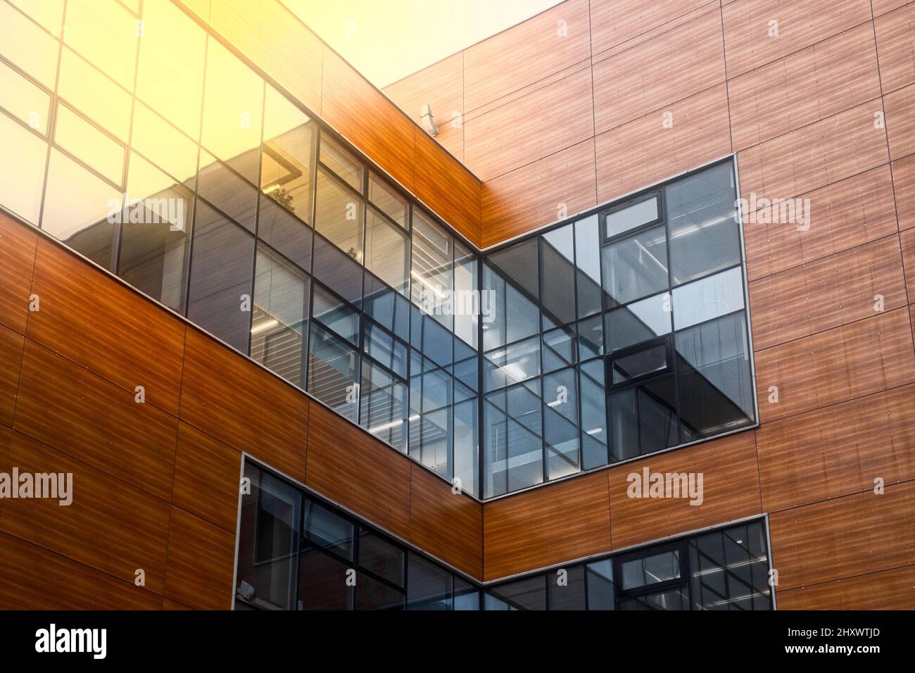 Modern office building window close up with sunrise, reflectioe. Modern ...