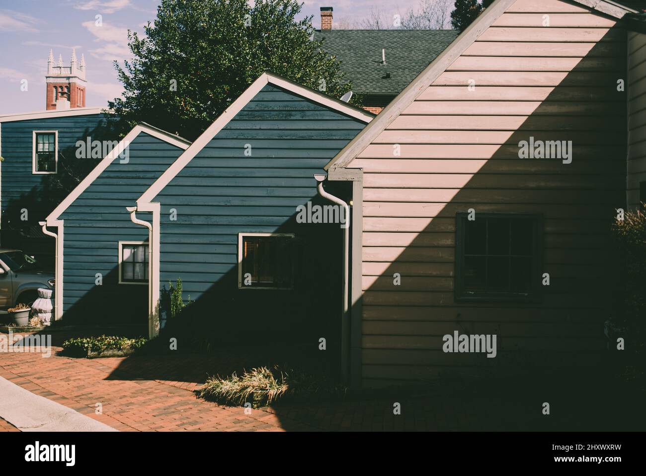 Exterior view of small residential houses in an urban area on a sunny ...