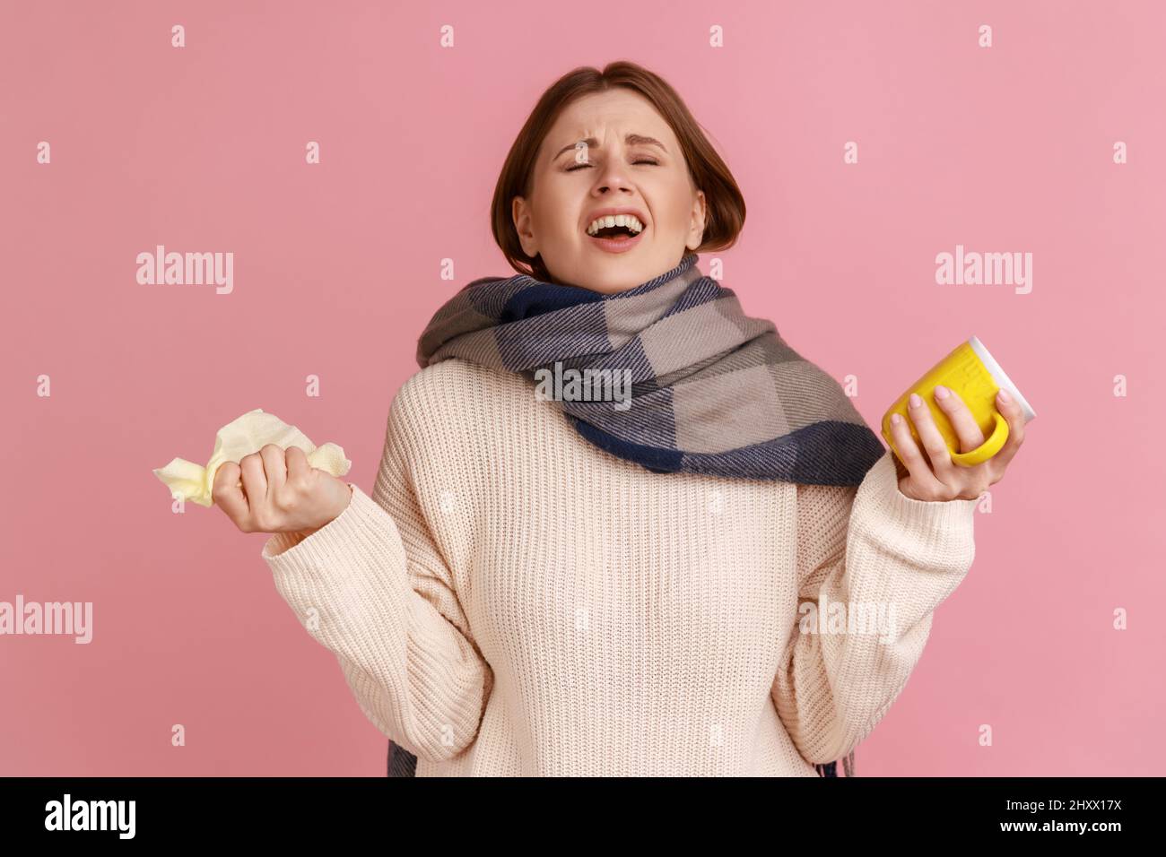 Portrait of unhappy unhealthy desperate blond woman being wrapped in ...
