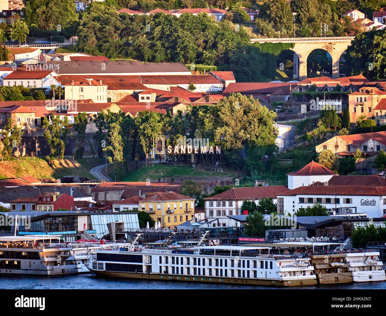 Distant view of the buildings and houses with ships for tourism in ...