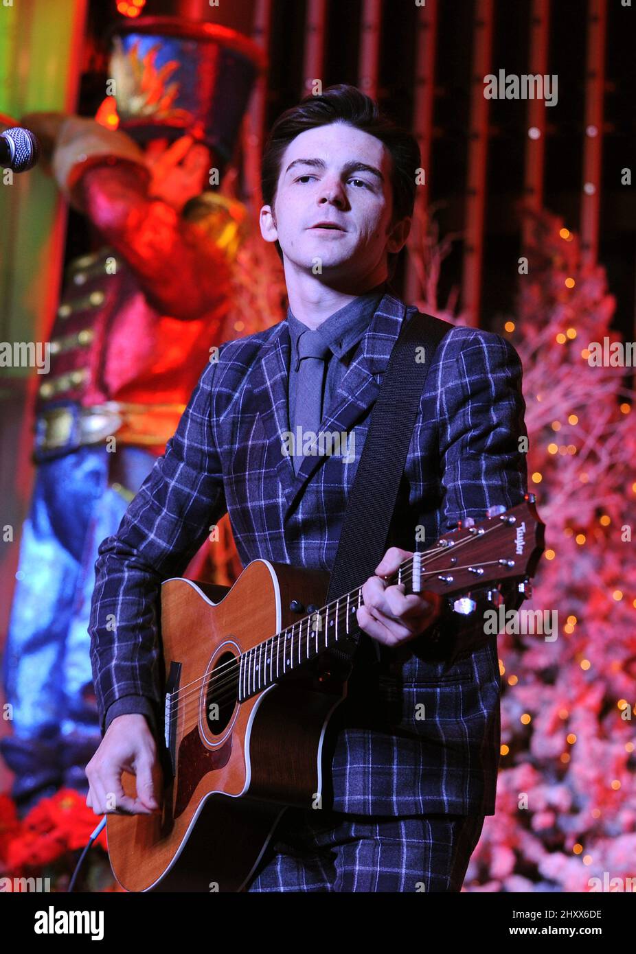 Drake Bell performing during Salvation Army's "Rock the Red Kettle ...
