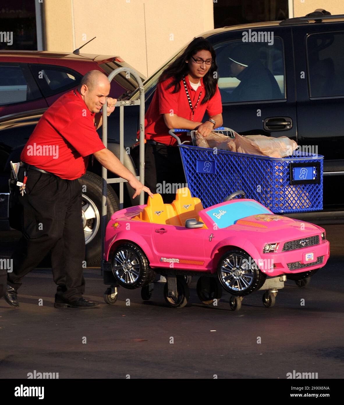 Buys daughter honor a pink barbie car hi-res stock photography and ...