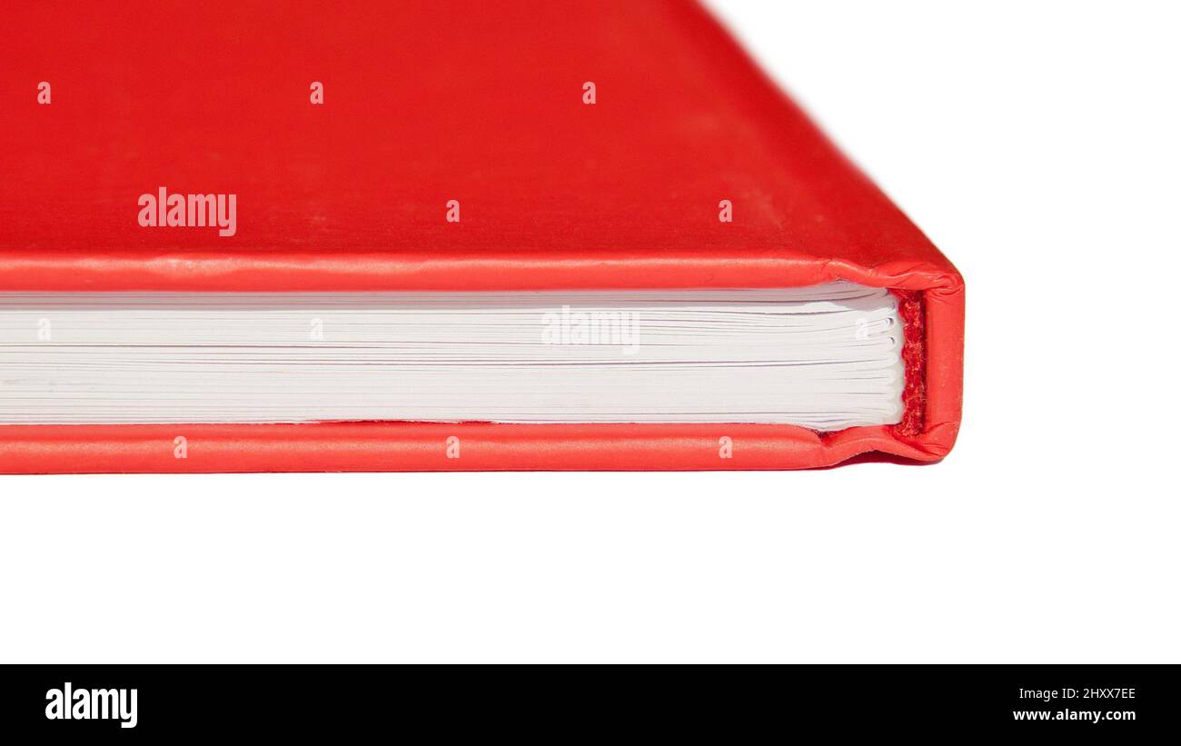 Close-up of new closed red book isolated on white background ...