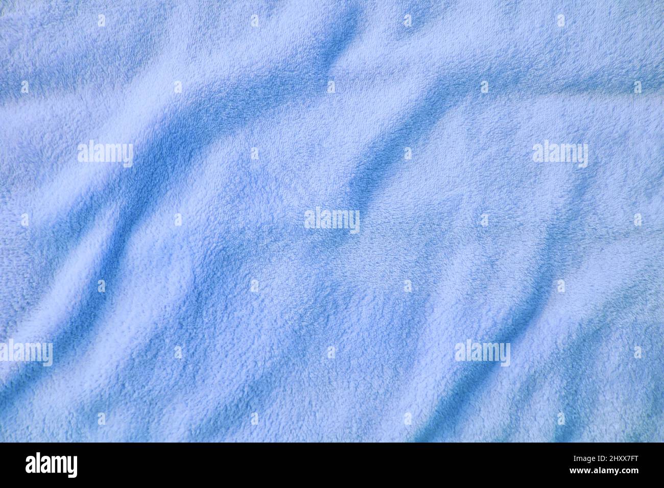 Fluffy gentle pastel blue fabric with waves and folds. Soft pastel ...