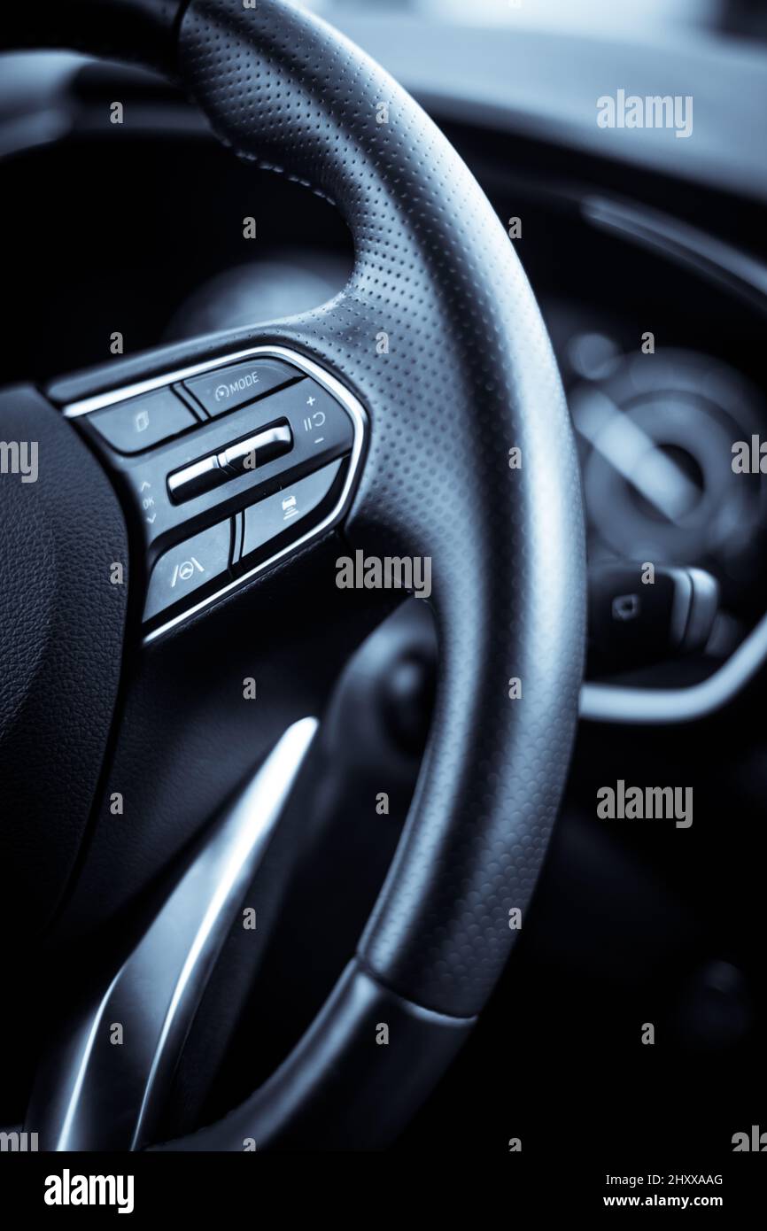 Modern car steering wheel with multifunction control switch Stock Photo ...