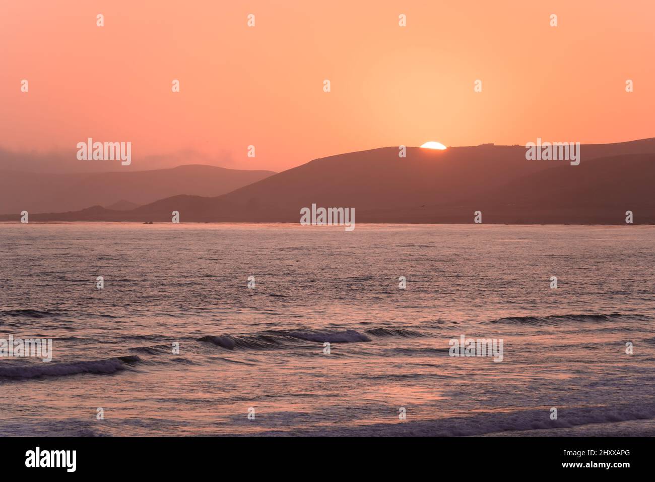 Beautiful view of a beach at sunset in Cayucos, California Stock Photo ...