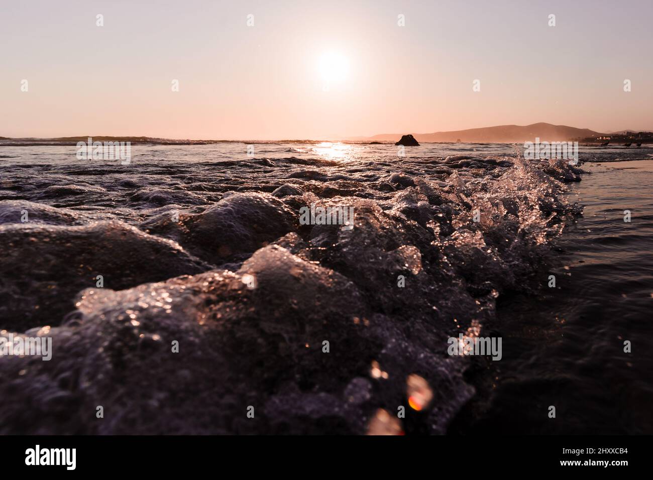 A beautiful view of the sunset over the wave in Cayucos, California ...