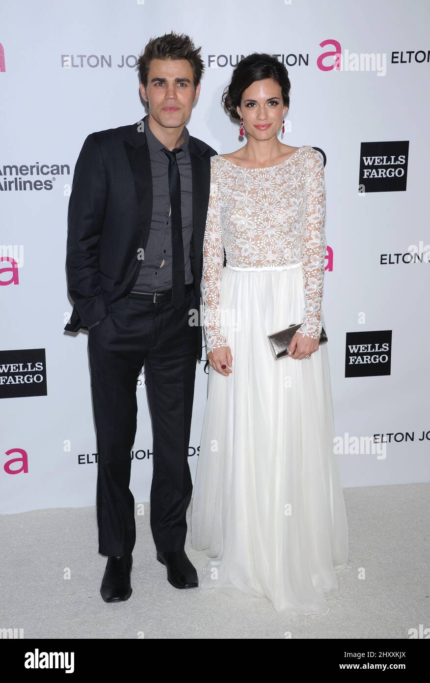 Paul Wesley and Torrey DeVitto attending the 20th Annual Elton John ...
