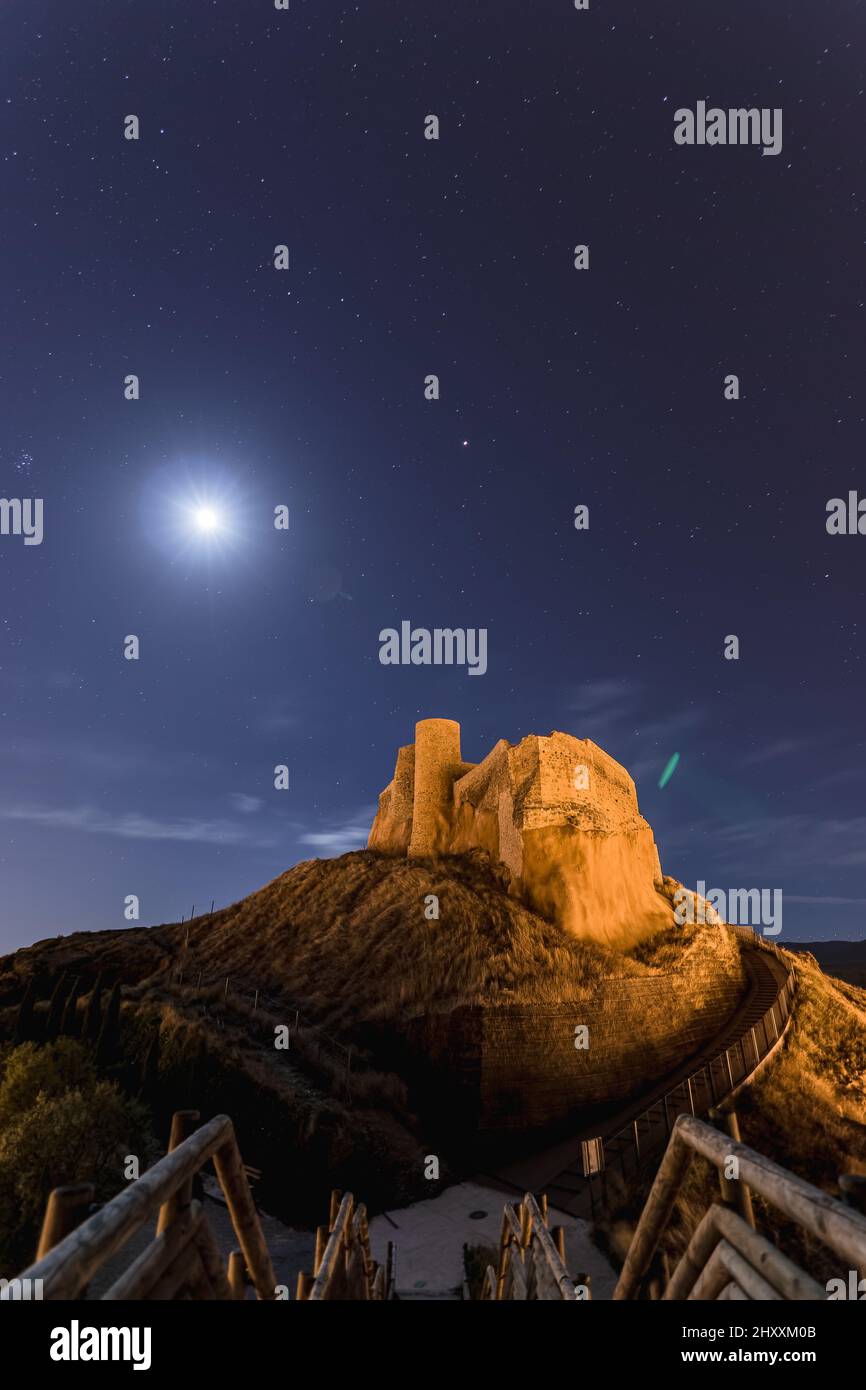 A fortress in the top of a hill and stairs to get to there and a shiny ...