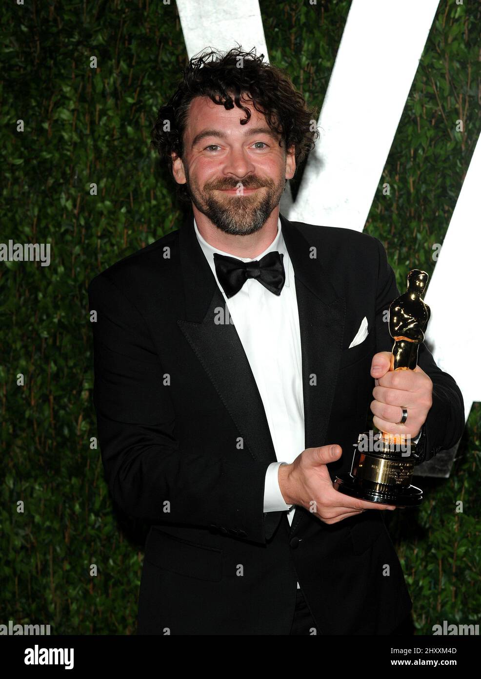 Alex Henning arriving at the 2012 Vanity Fair Oscar Party held at the ...