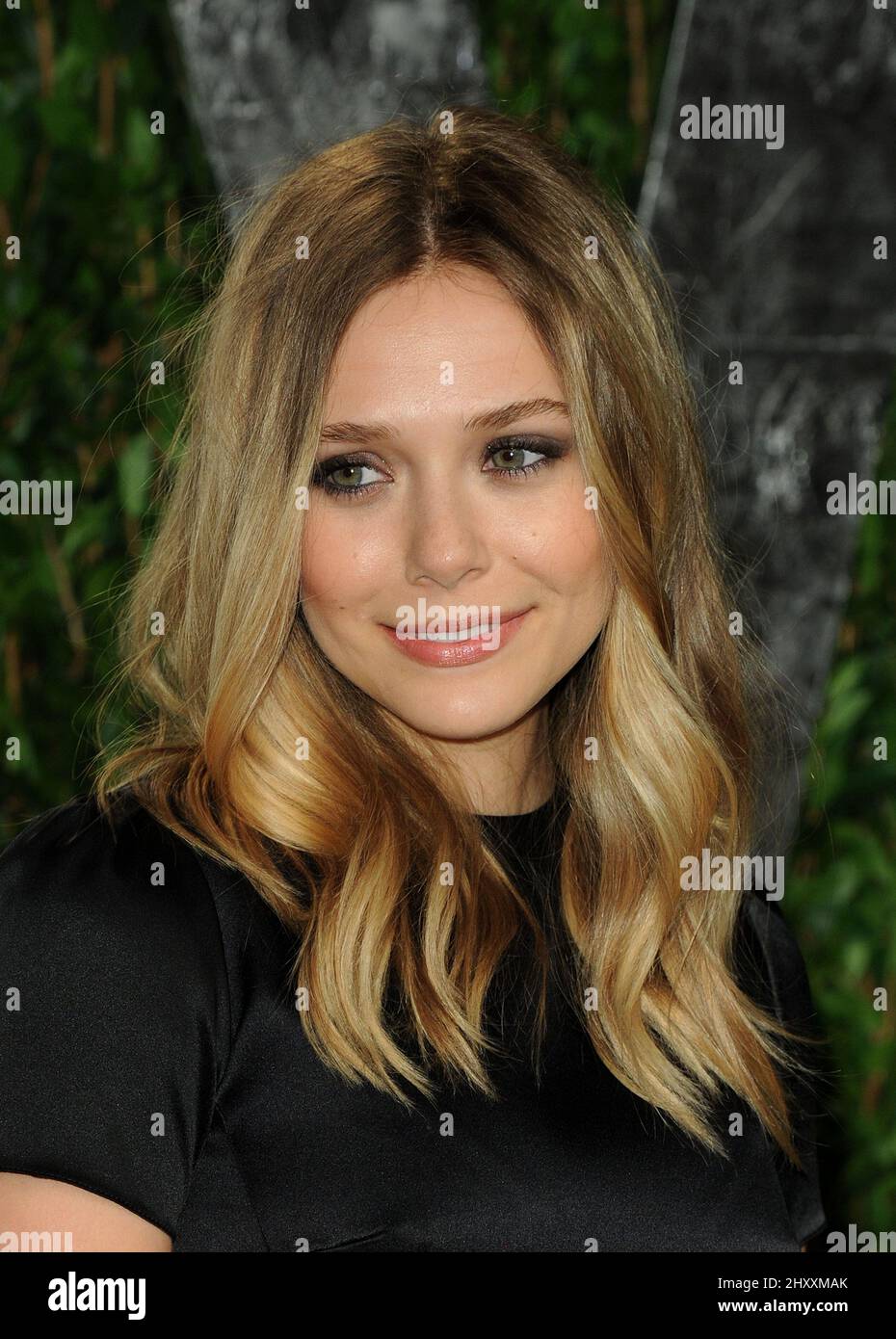Elizabeth Olsen arriving at the 2012 Vanity Fair Oscar Party held at ...